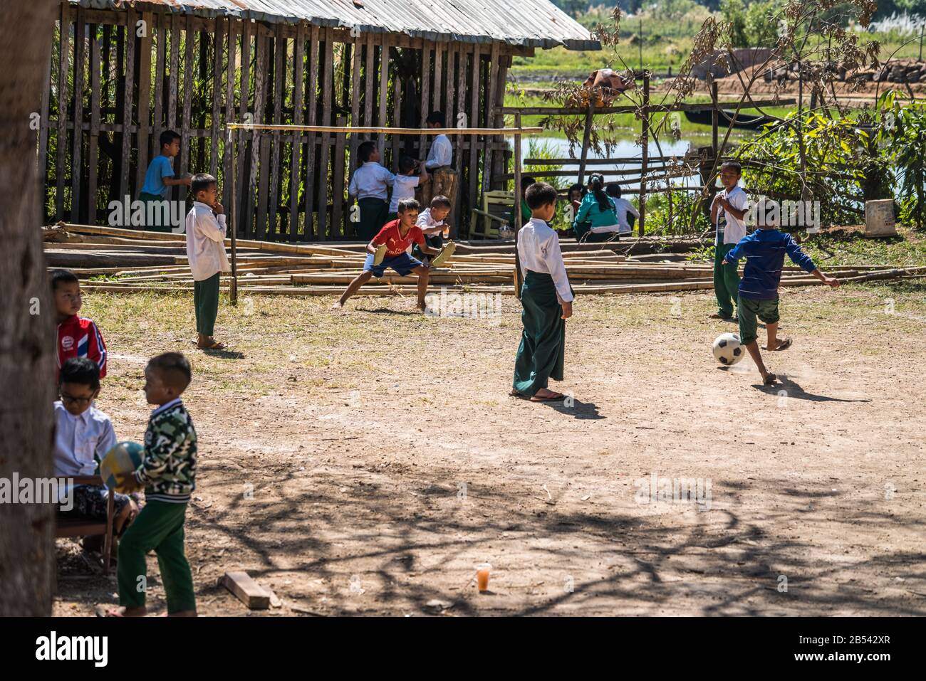 Local boys playing football, Inlee lake, Myanmar, Asia Stock Photo - Alamy