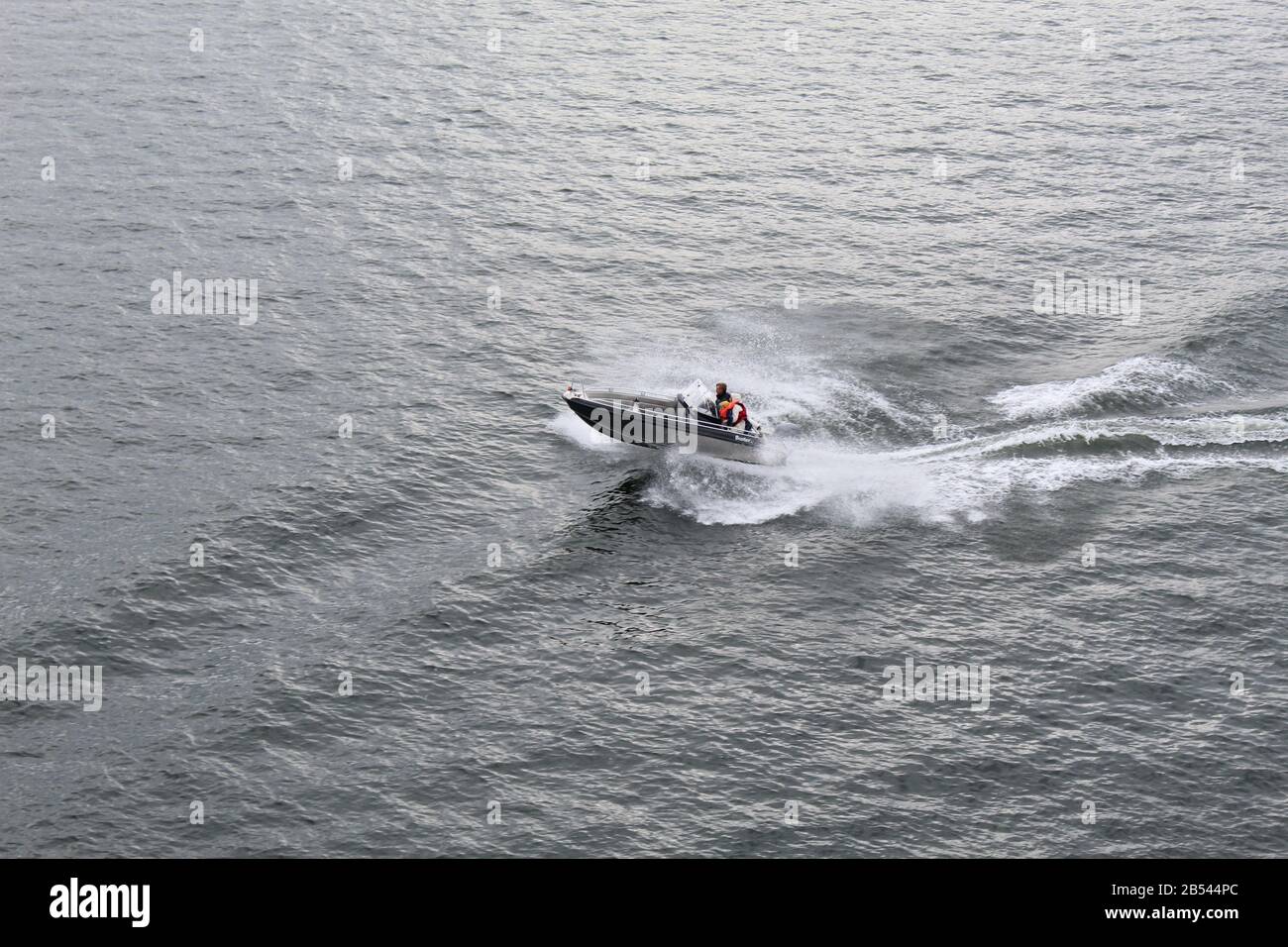 Boat sails on the sea Stock Photo - Alamy