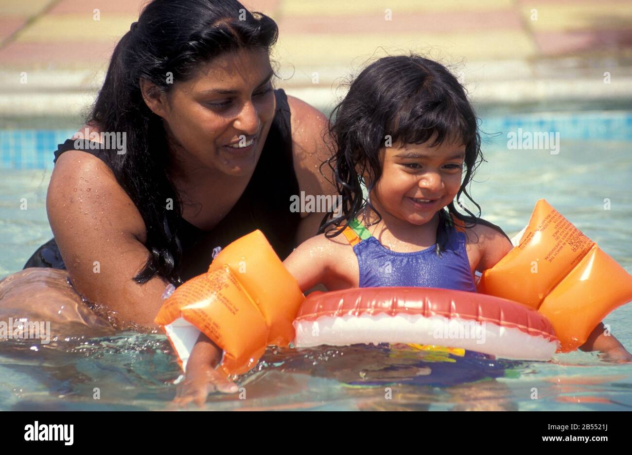 Mother Daughter Swimming Pool High Resolution Stock Photography and ...