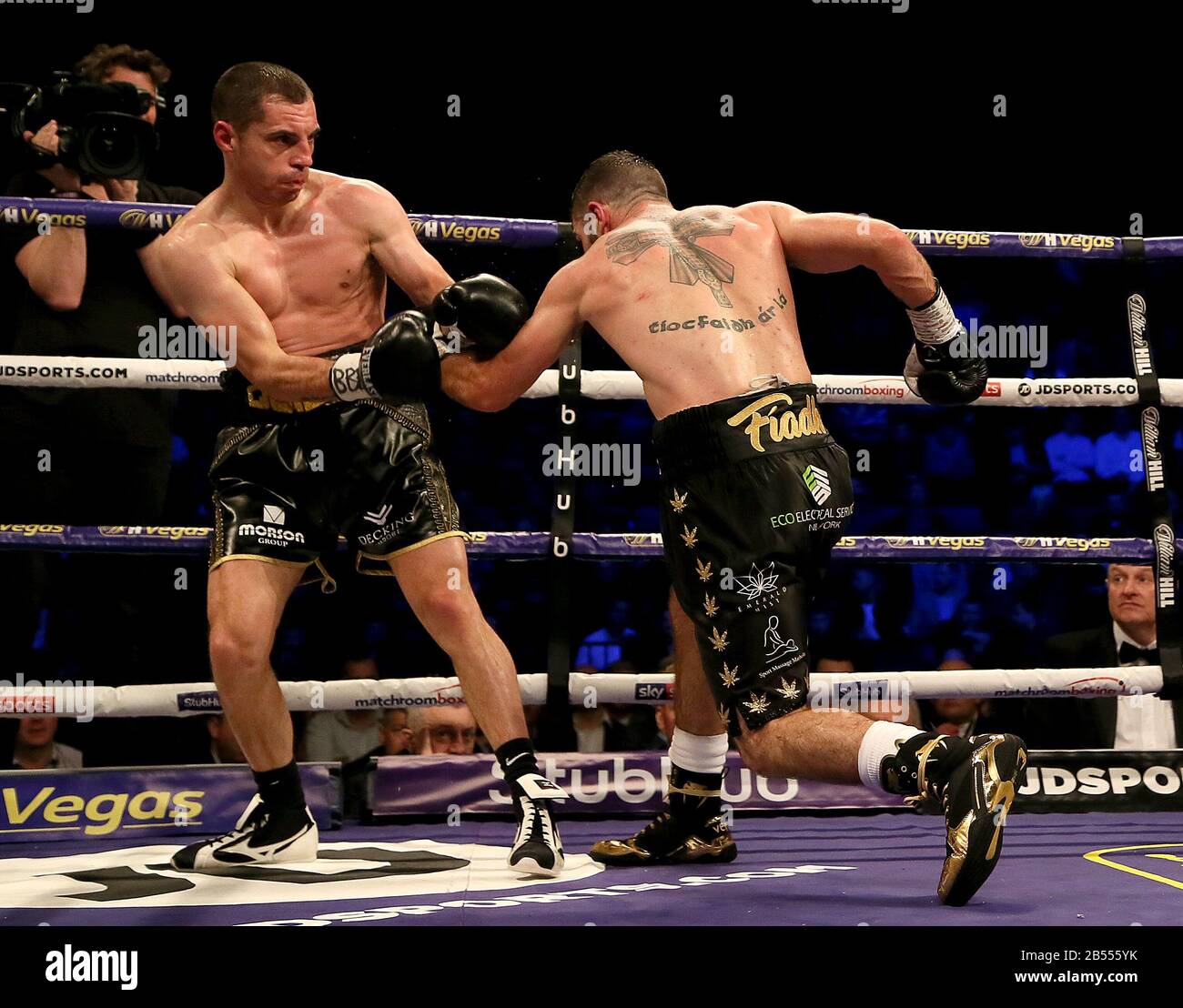 Scott Quigg (left) in action against Jono Carroll in their Super ...