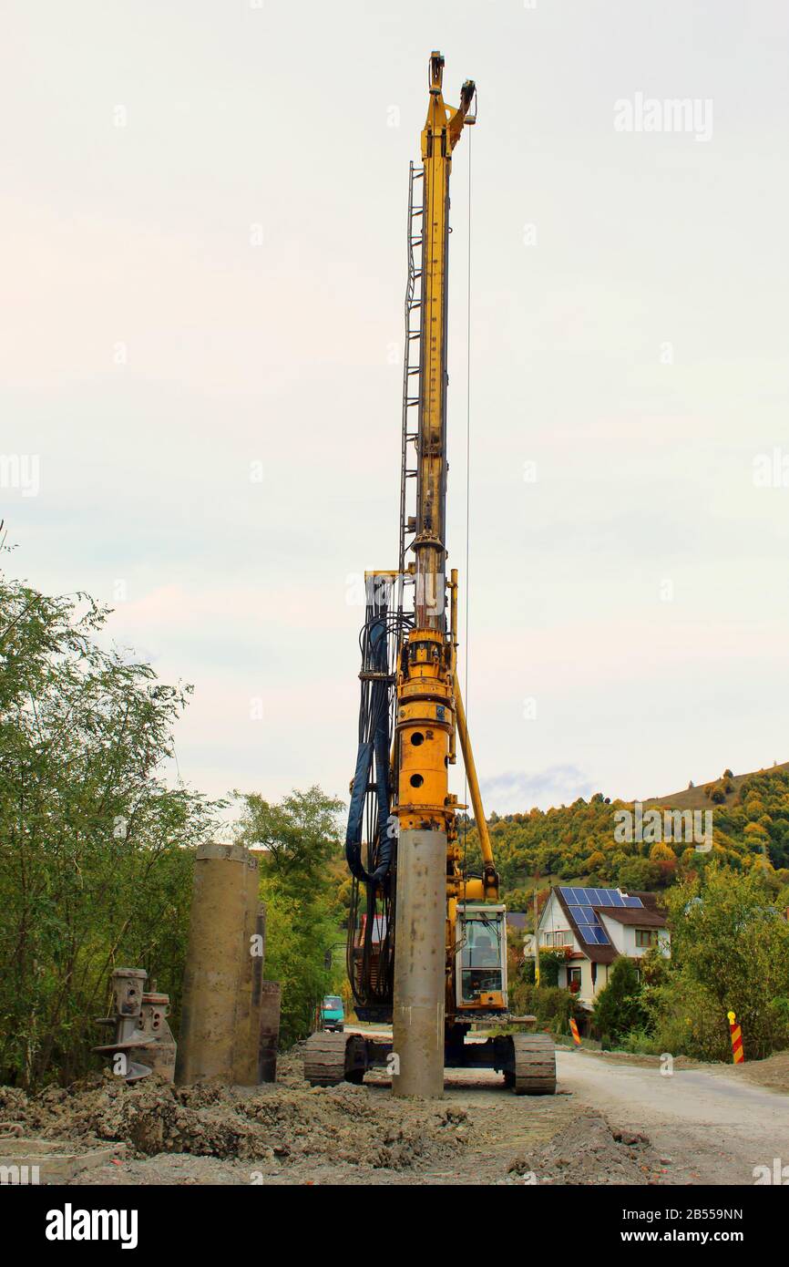 Machinery drilling on construction site Stock Photo - Alamy