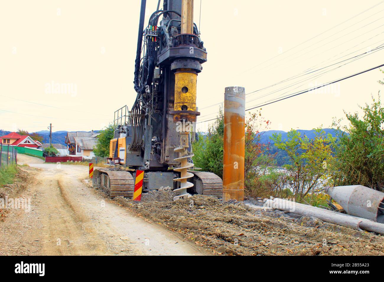 Machinery drilling on construction site Stock Photo - Alamy