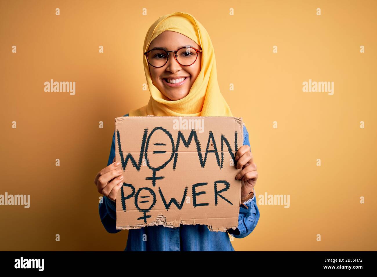 Beautiful woman with curly hair wearing muslim hijab asking for women ...