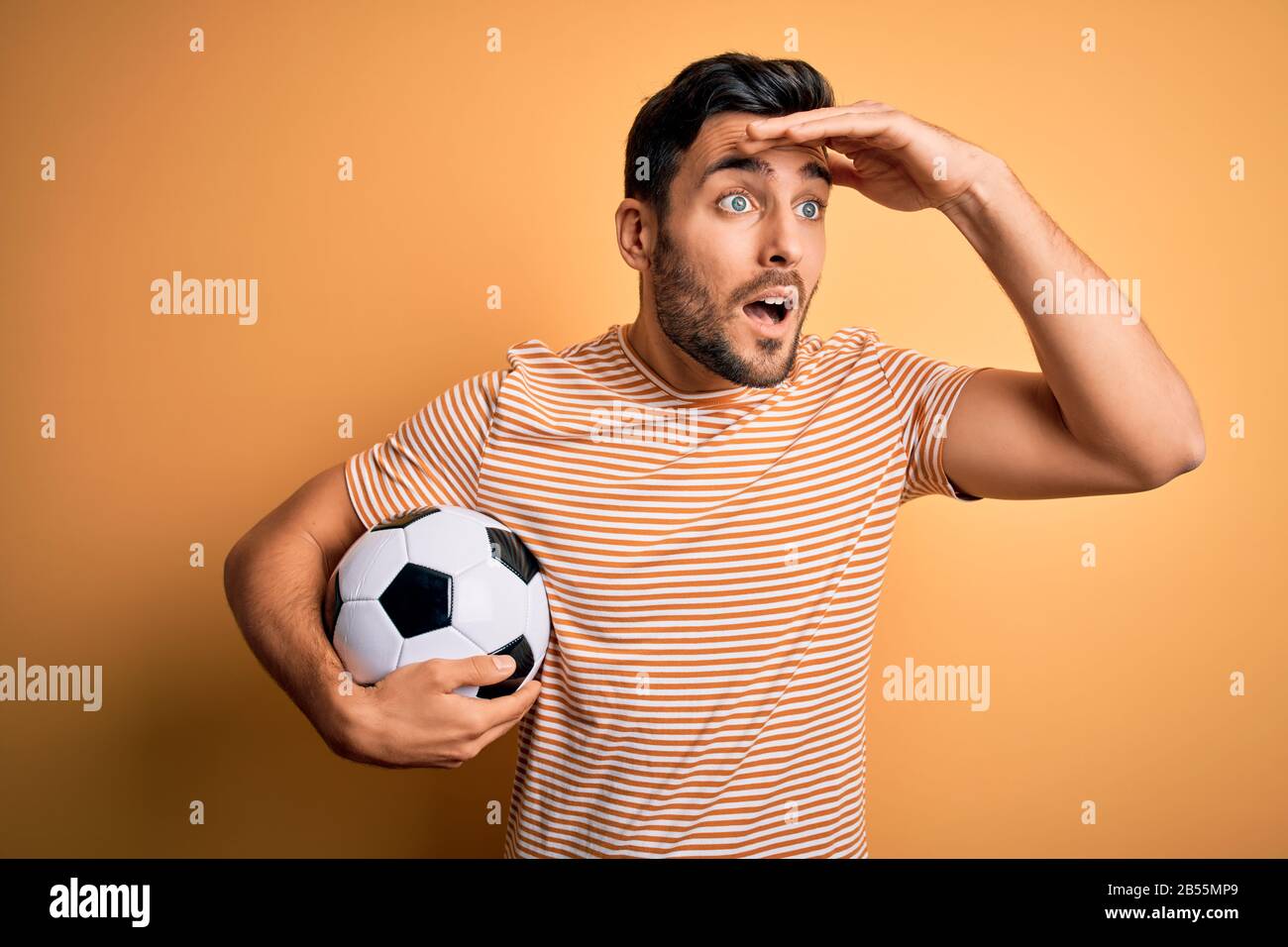 Footballl fan watching game hi-res stock photography and images - Alamy