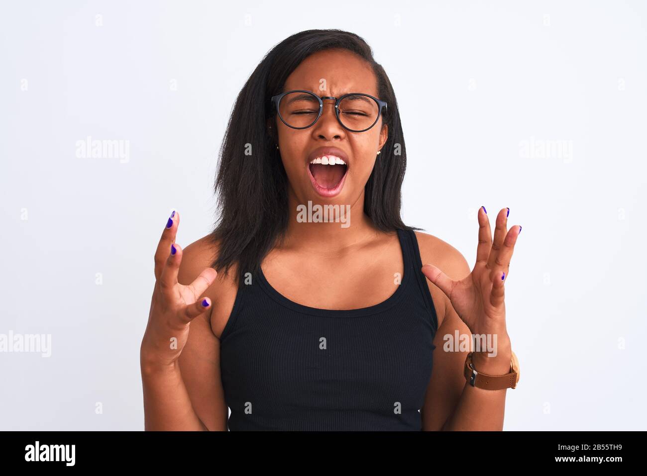 Beautiful young african american woman wearing glasses over isolated ...