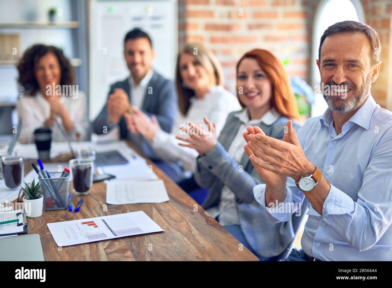 Group of business workers smiling happy and confident. Working together ...