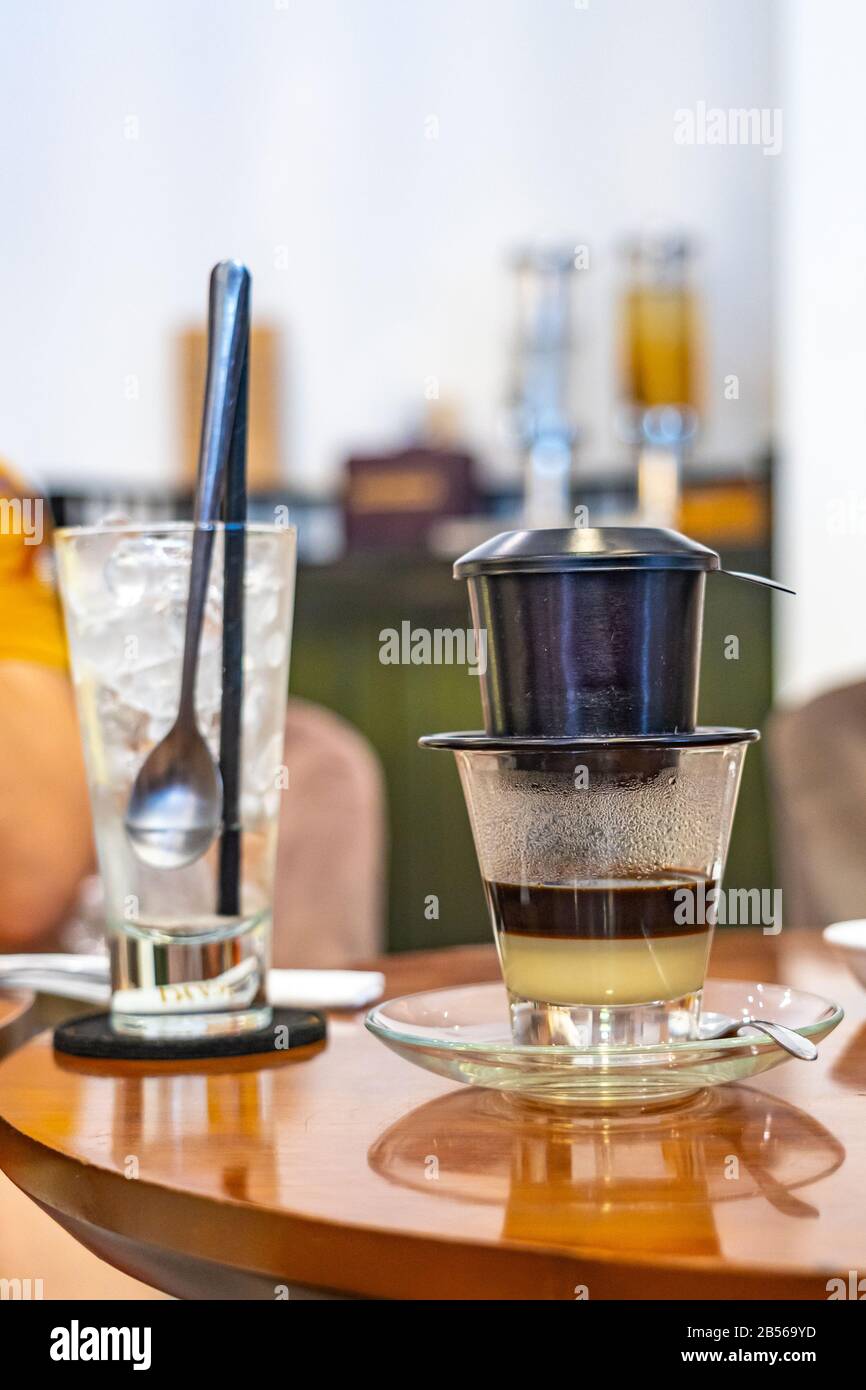 Traditional Vietnamese fin coffee with condensed milk and ice Stock ...