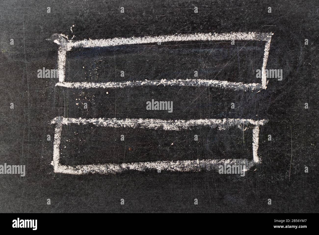 White chalk hand drawing in square or banner shape on black board ...