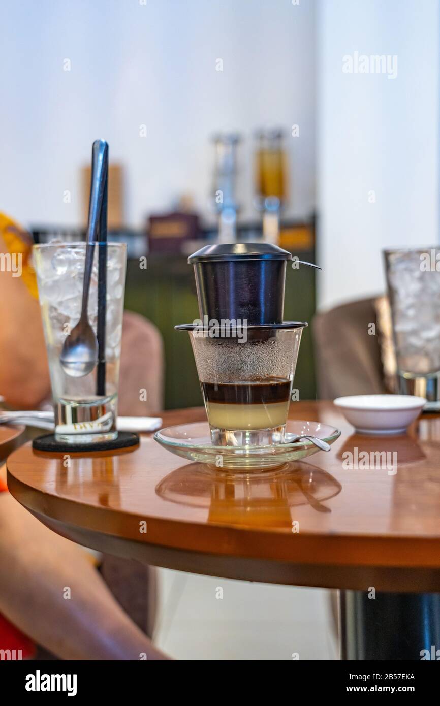 Vietnam traditional dripping coffee with condensed milk and ice Stock ...