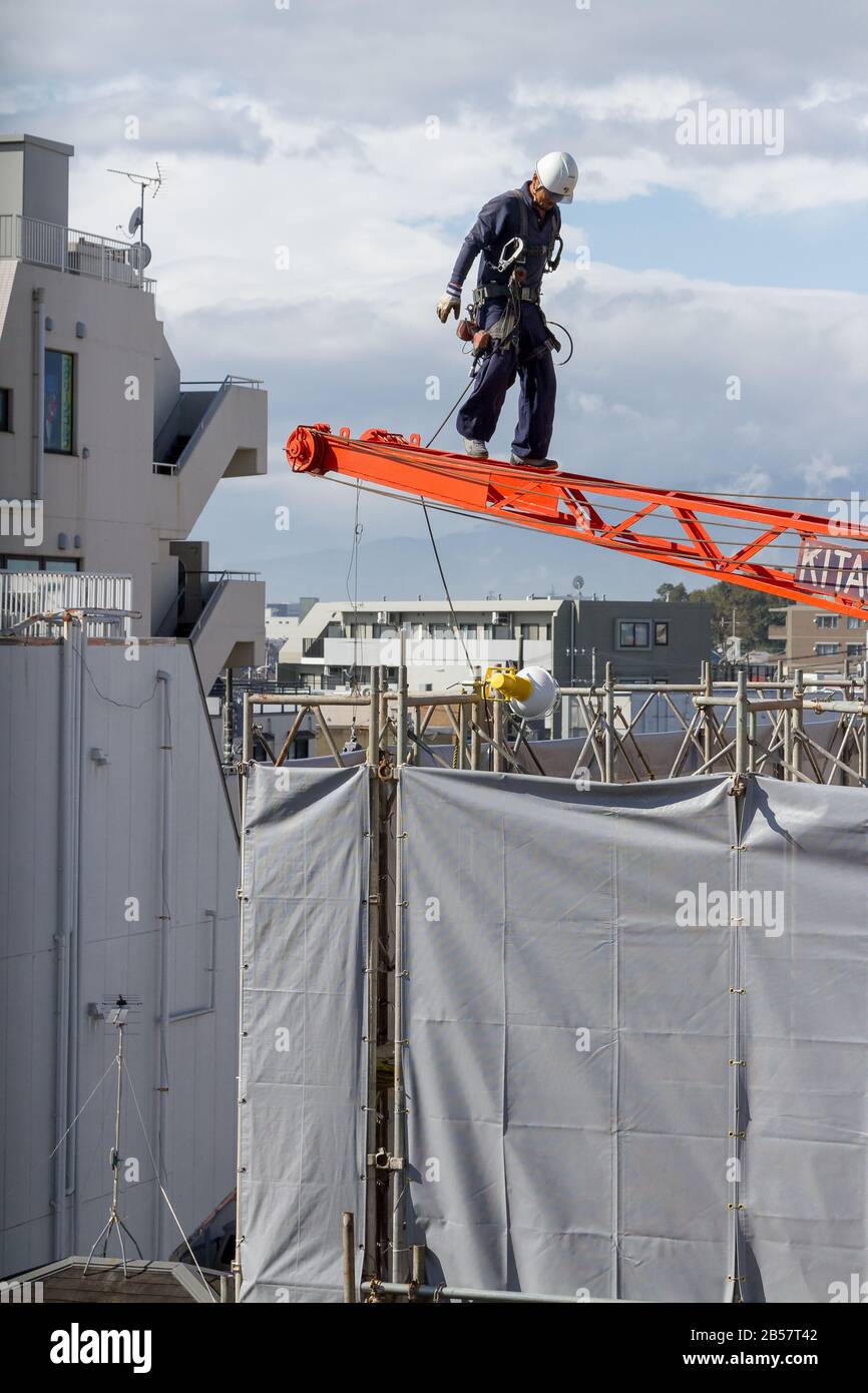 Japanese Construction Worker On A Crane High Resolution Stock ...
