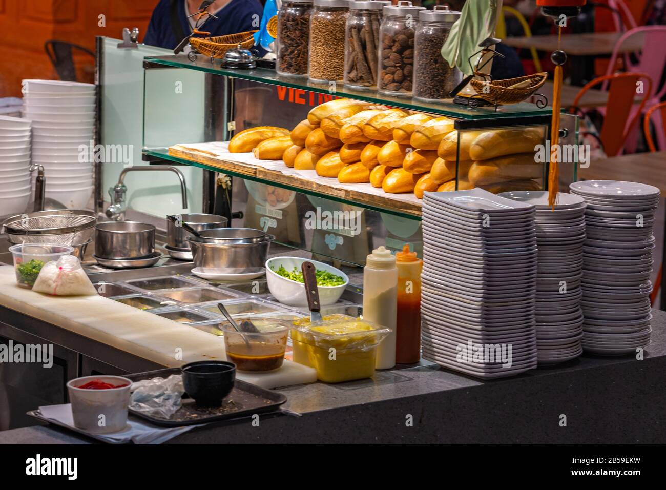 Vietnamese banh mi food stand's kitchen in foodcourt Stock Photo - Alamy