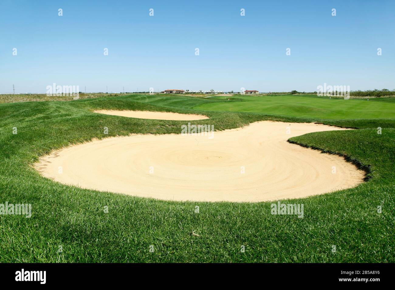 Sand bunker on the golf course Stock Photo - Alamy