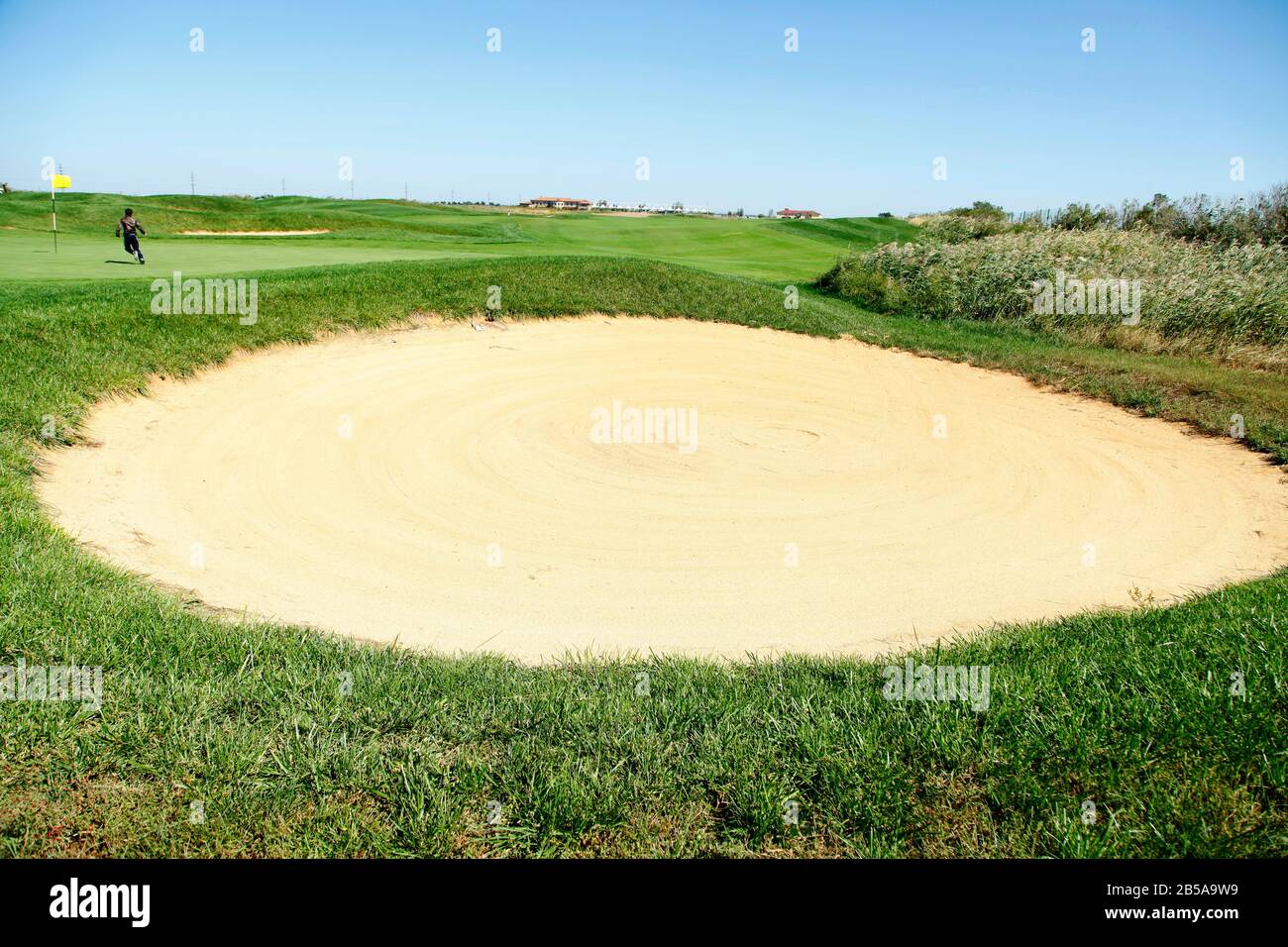 Sand bunker on the golf course Stock Photo - Alamy