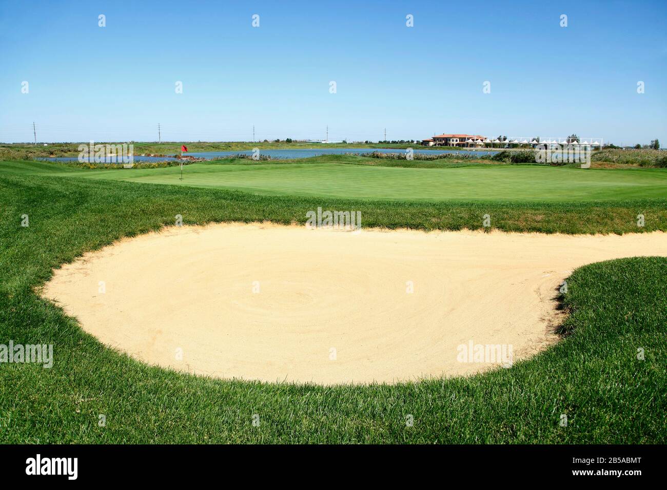 Sand bunker on the golf course Stock Photo - Alamy