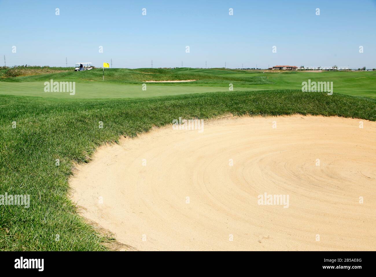 Sand bunker on the golf course Stock Photo - Alamy