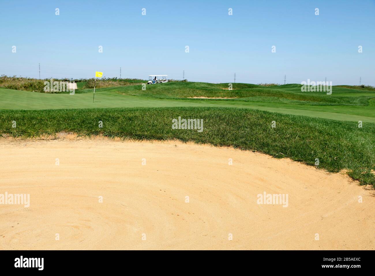 Sand bunker on the golf course Stock Photo - Alamy