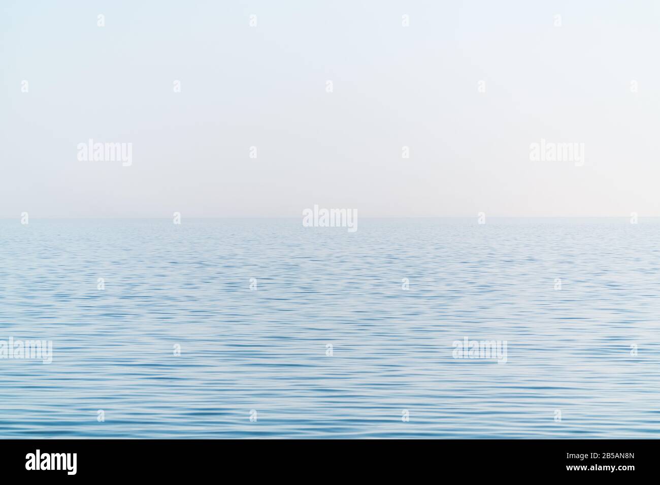 Blue sea with the skyline Stock Photo - Alamy