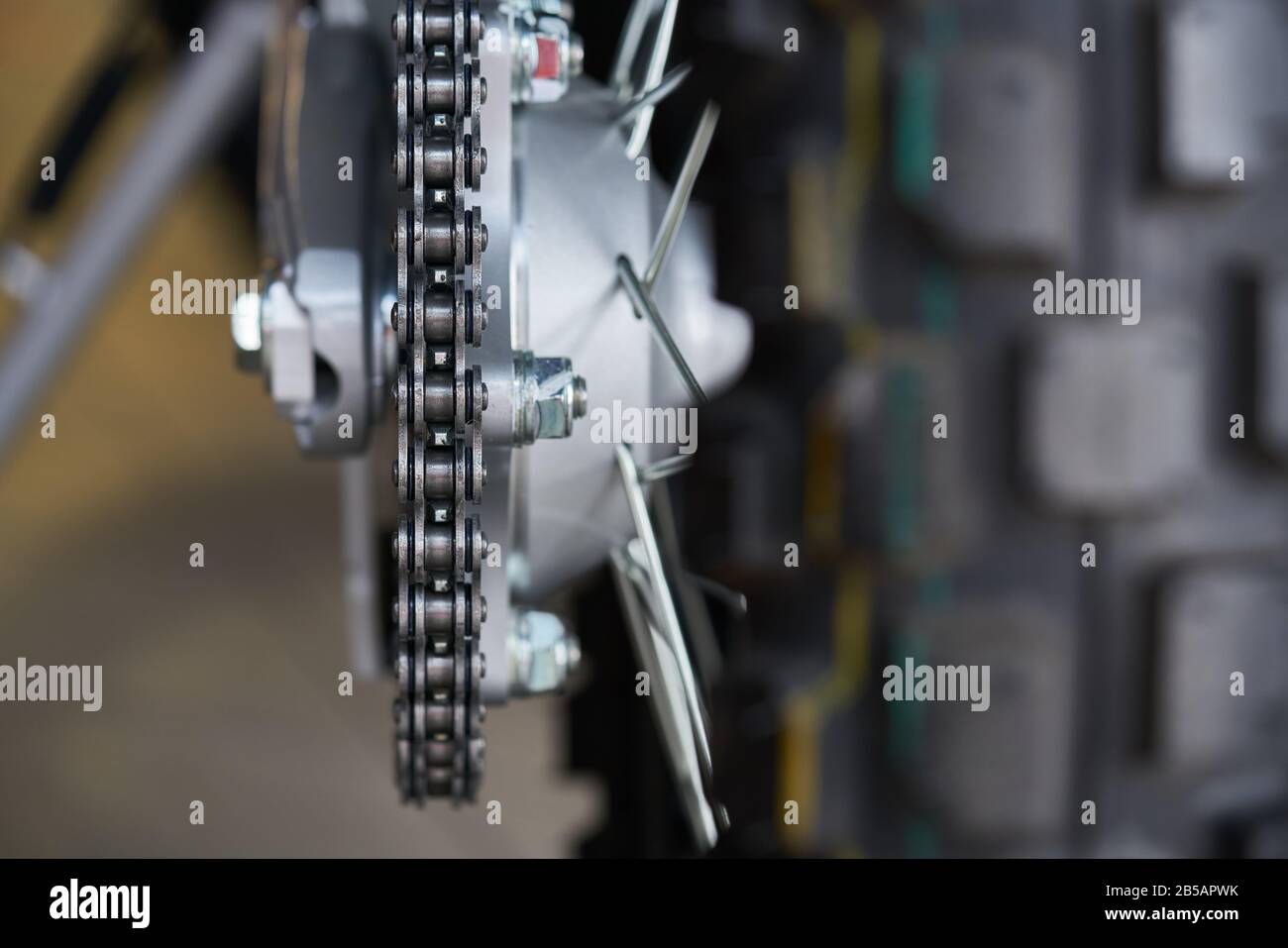 Detail of a motorcycle rear chain Stock Photo - Alamy