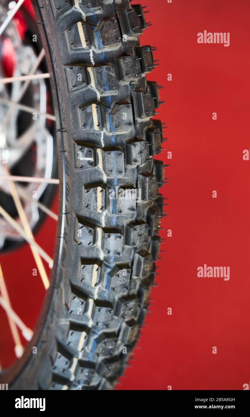 The front tire of a parked custom motorcycle Stock Photo - Alamy