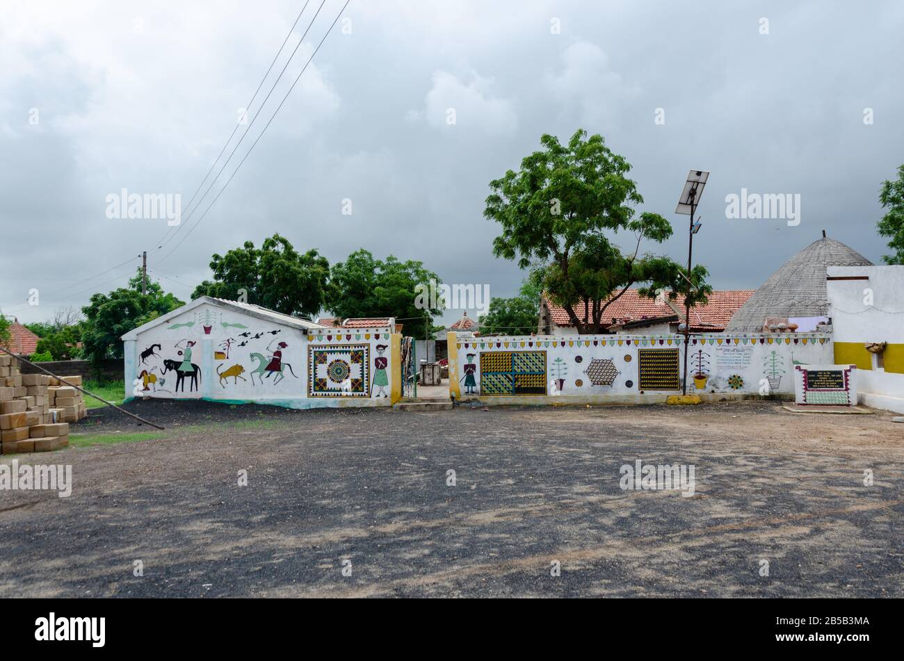 Artwork painted on the walls of houses in Gandhi Nu Gam, Ludiya Village ...