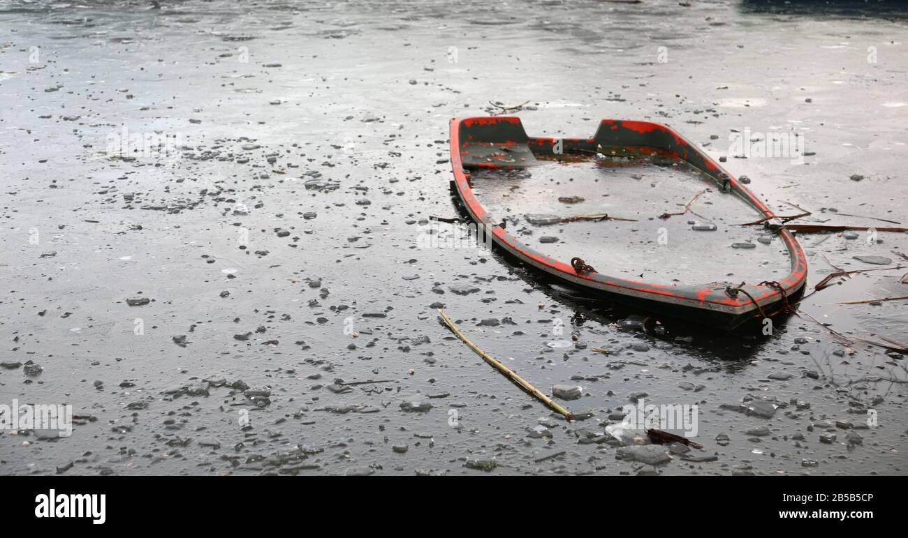 little boat on the ice in winter Stock Photo - Alamy