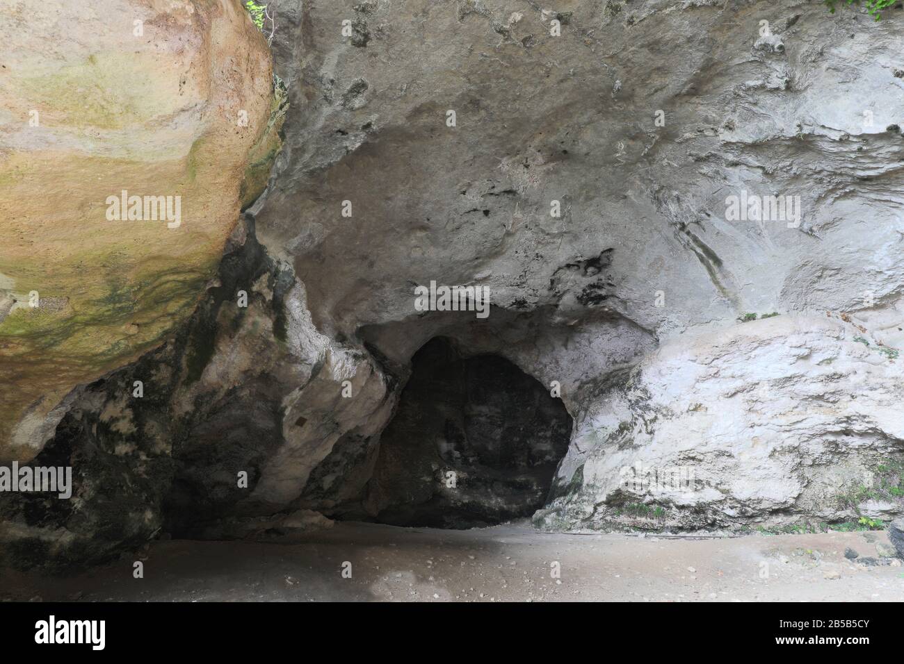 large cave inside the mountain used by primitive prehistoric men as a ...