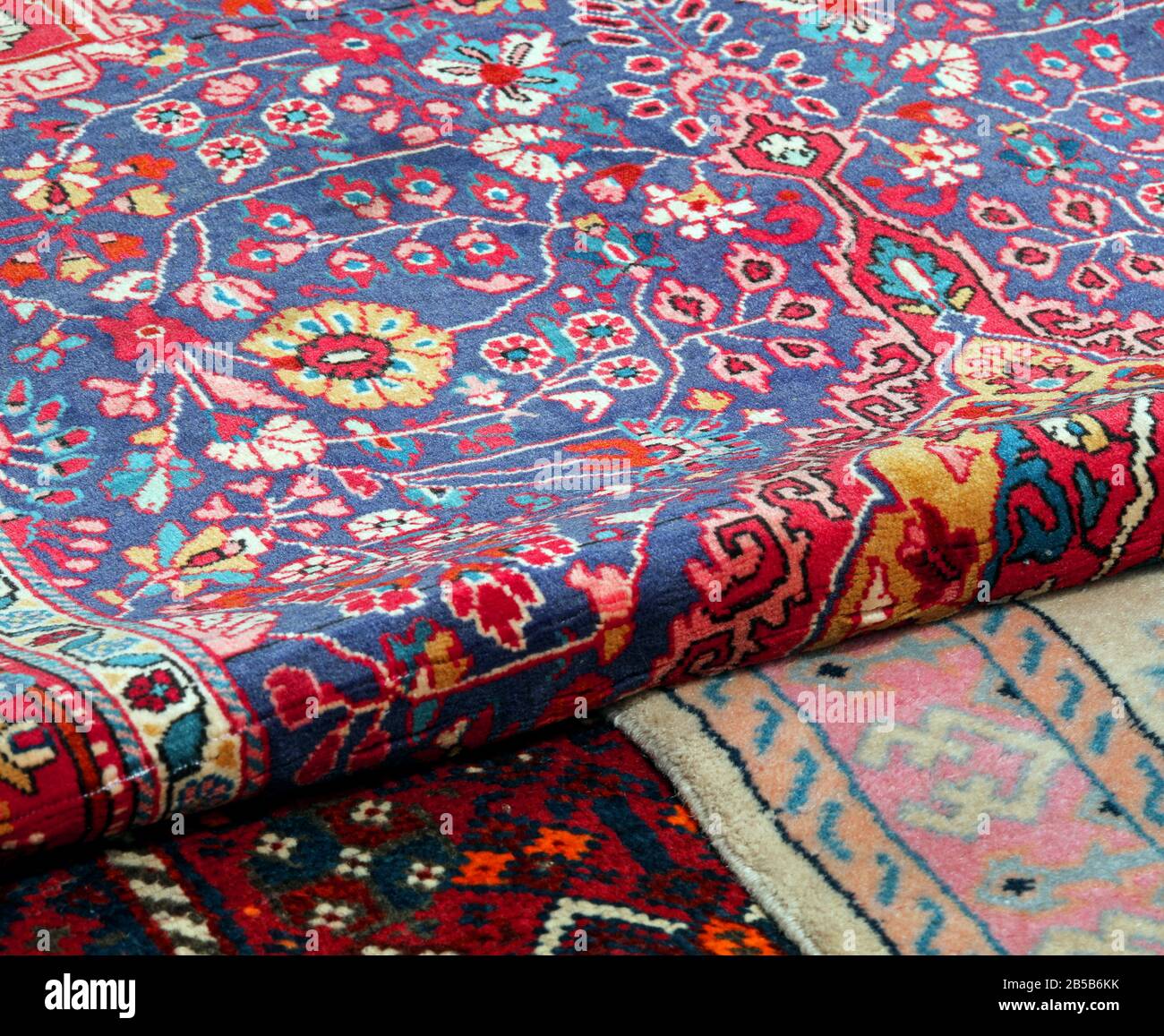 background of many oriental carpets to decorate your home Stock Photo ...