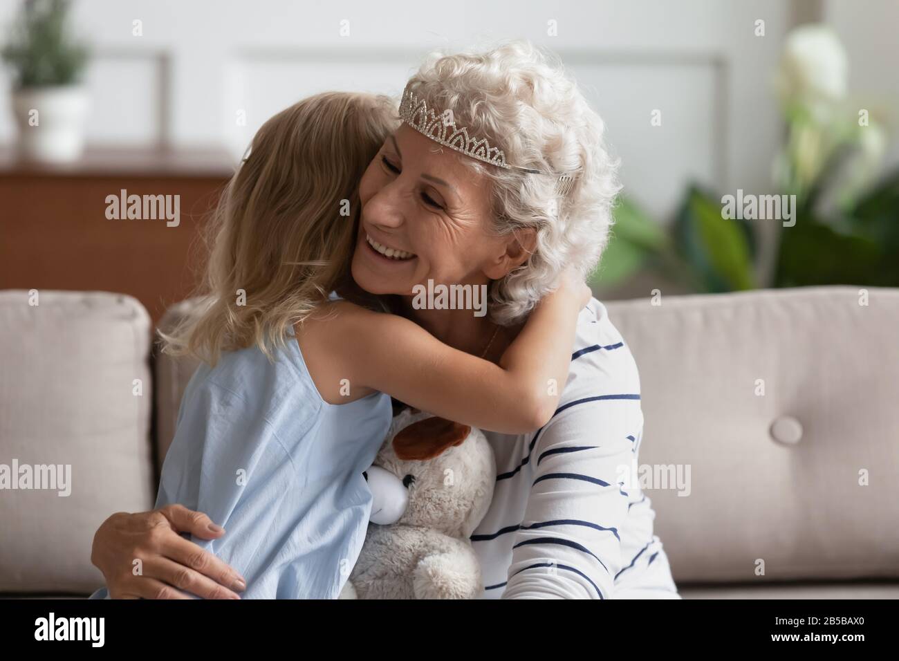 Happy grandmother have fun playing with grandchild Stock Photo - Alamy