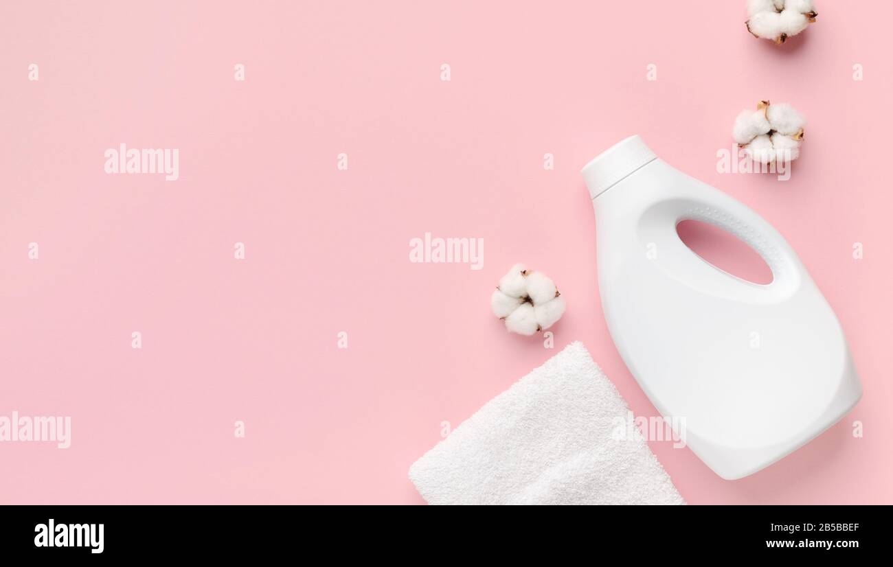 Laundry detergent bottle with fabric softener isolated on pink Stock ...