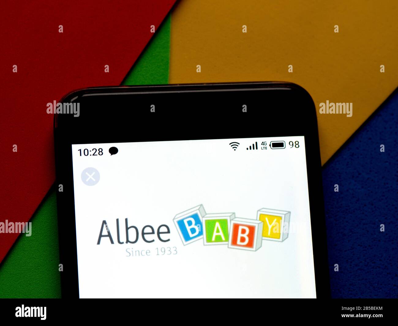 In this photo illustration the Albee Baby logo is seen displayed on a ...