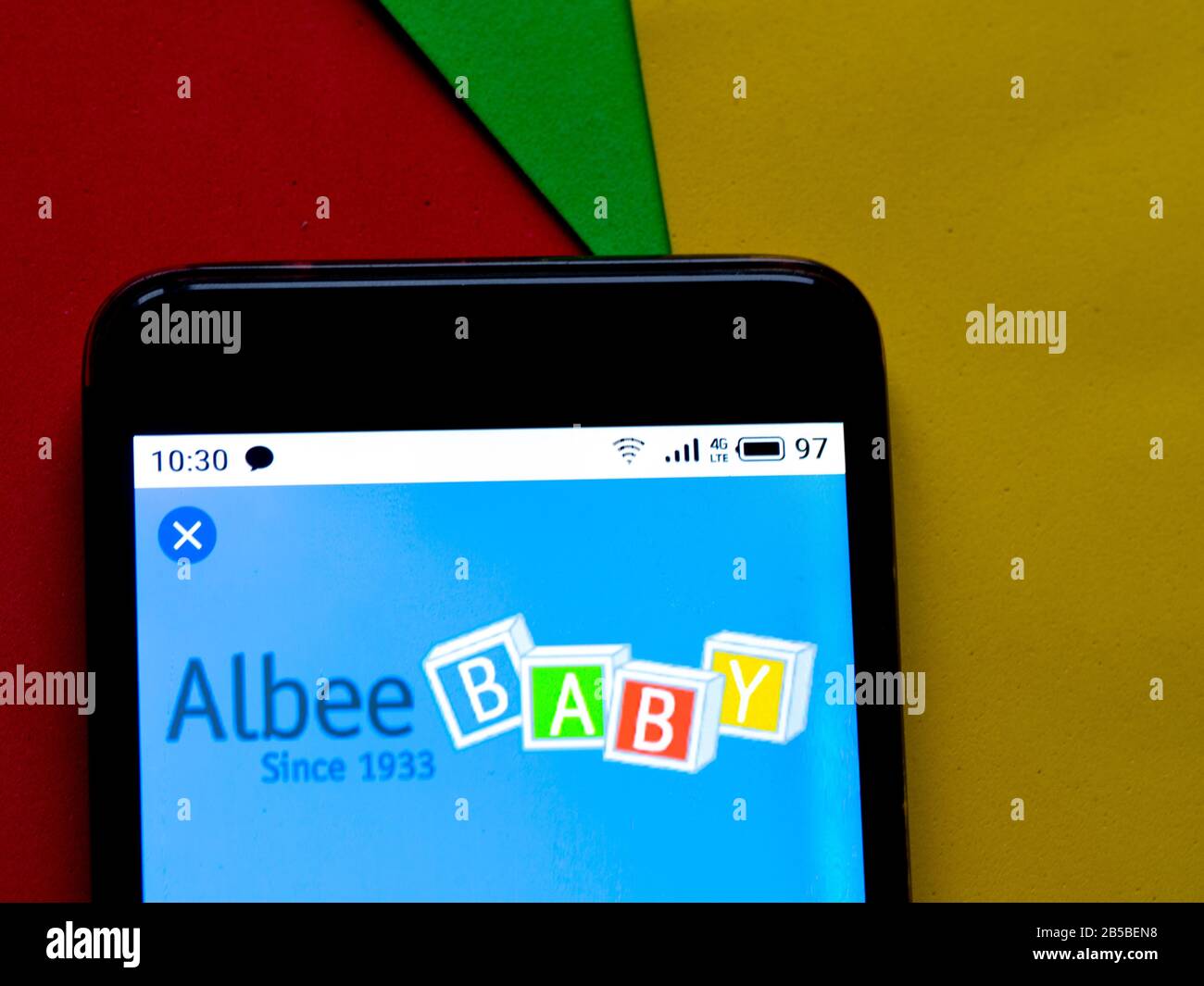In this photo illustration the Albee Baby logo is seen displayed on a ...