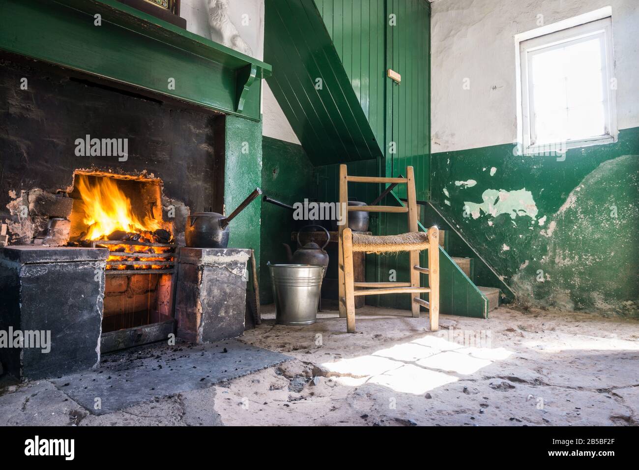 Traditional working class kitchen hearth in the Ulster Folk Museum ...