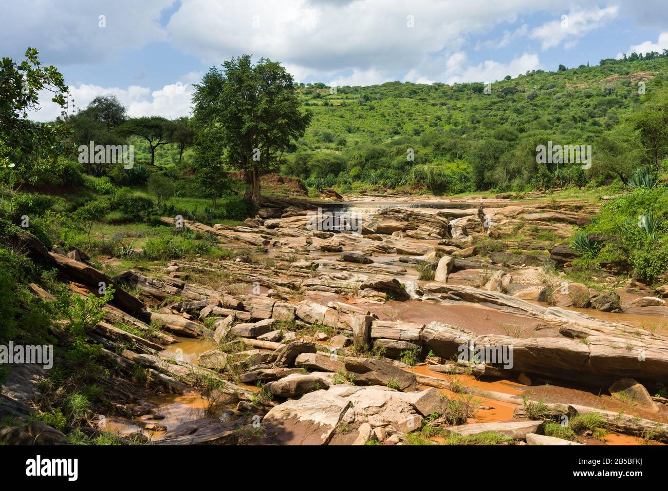The Mwooni river flowing through hills in Makueni County, Kenya Stock ...