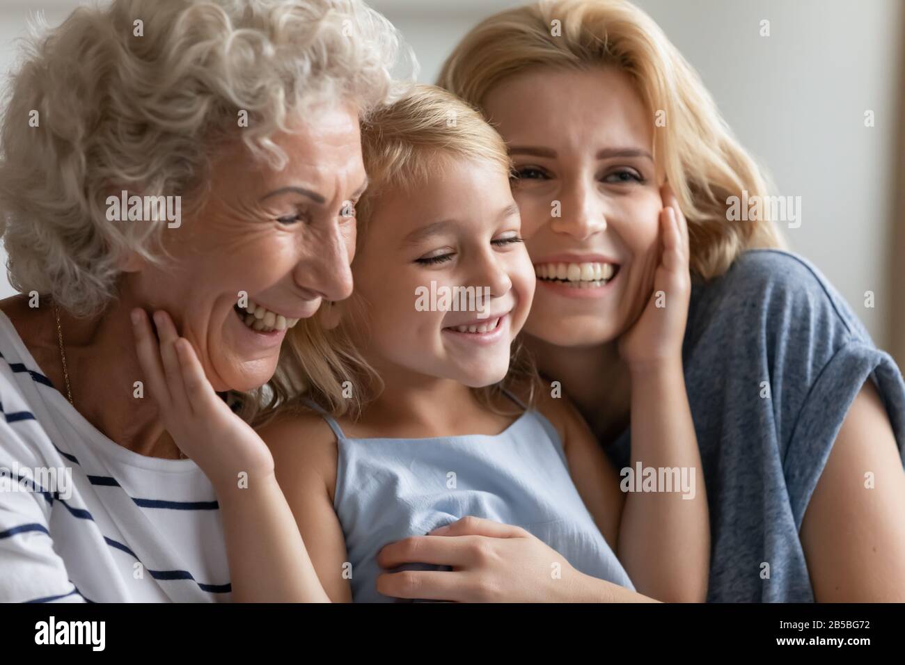 Happy three generations of women relax at home together Stock Photo - Alamy