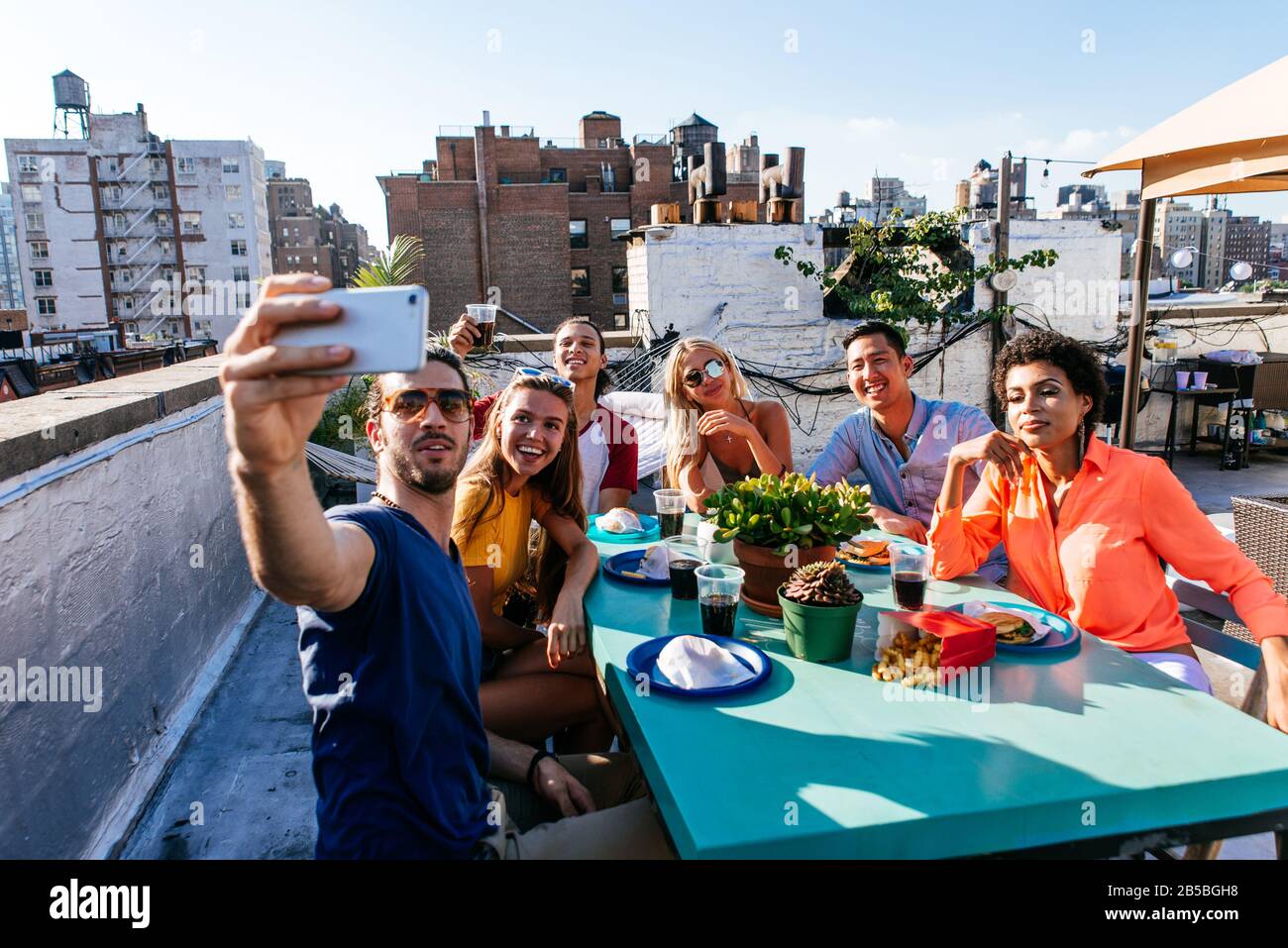 Barbecue party on top of the roof hi-res stock photography and images ...