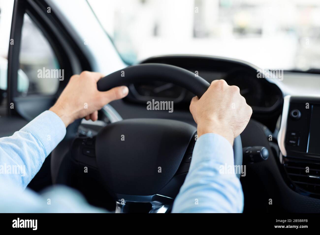 Man at steering wheel hi-res stock photography and images - Alamy