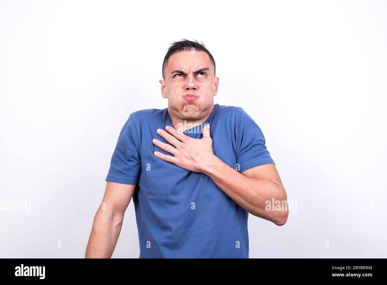 Sore man White background. middle plane Stock Photo - Alamy