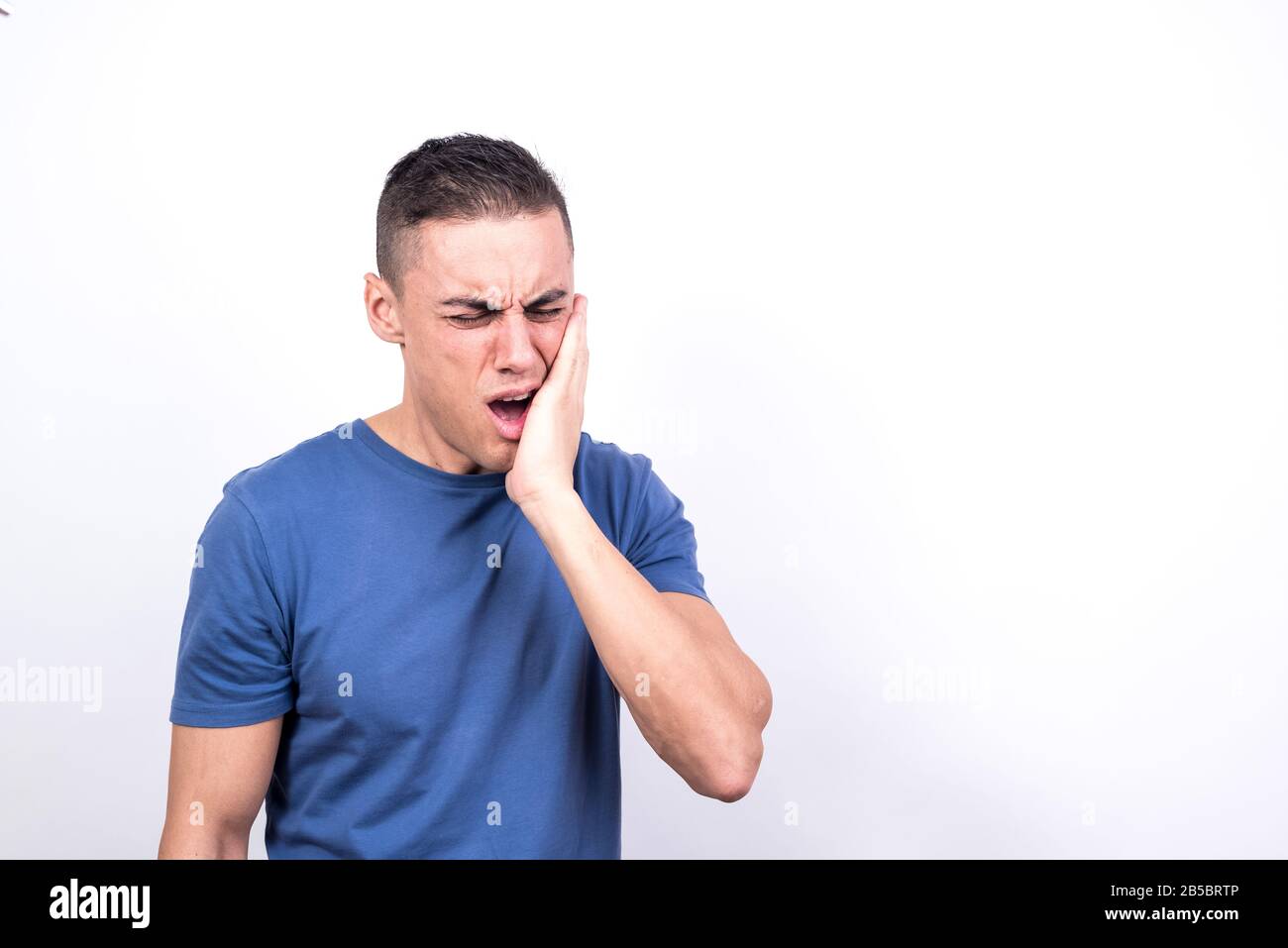 Sore man White background. middle plane Stock Photo - Alamy