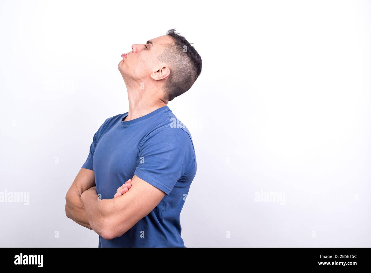 Angry man. white background, medium shot Stock Photo - Alamy