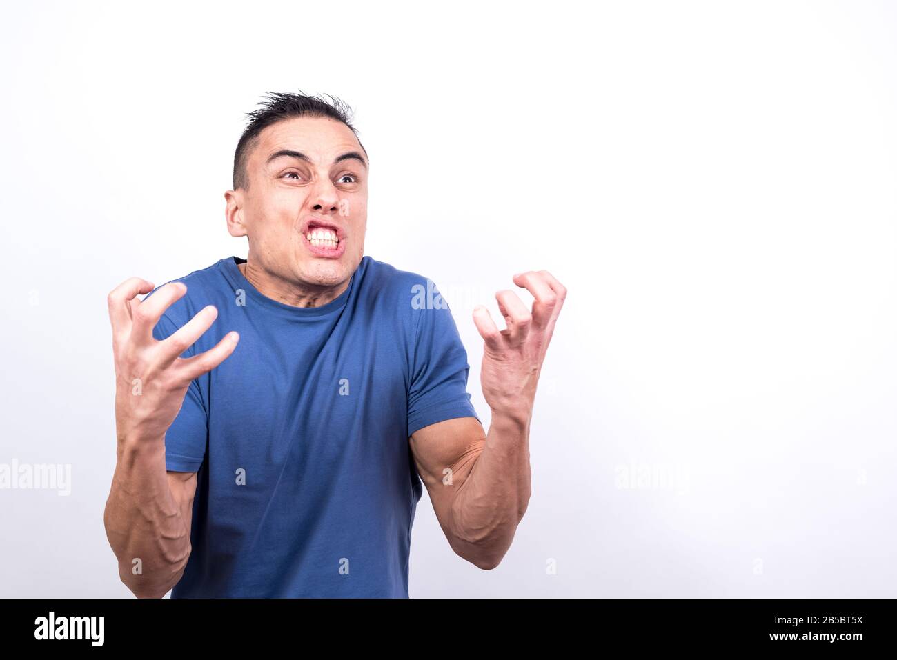 hysterical man White background, medium shot Stock Photo - Alamy