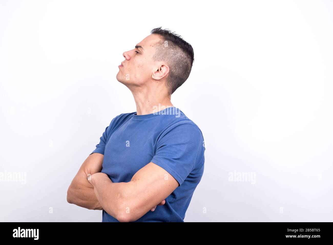 Angry man. white background, medium shot Stock Photo - Alamy
