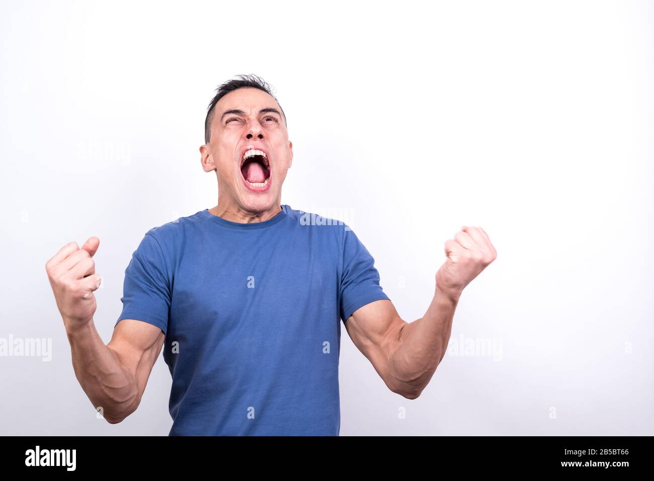 hysterical man White background, medium shot Stock Photo - Alamy