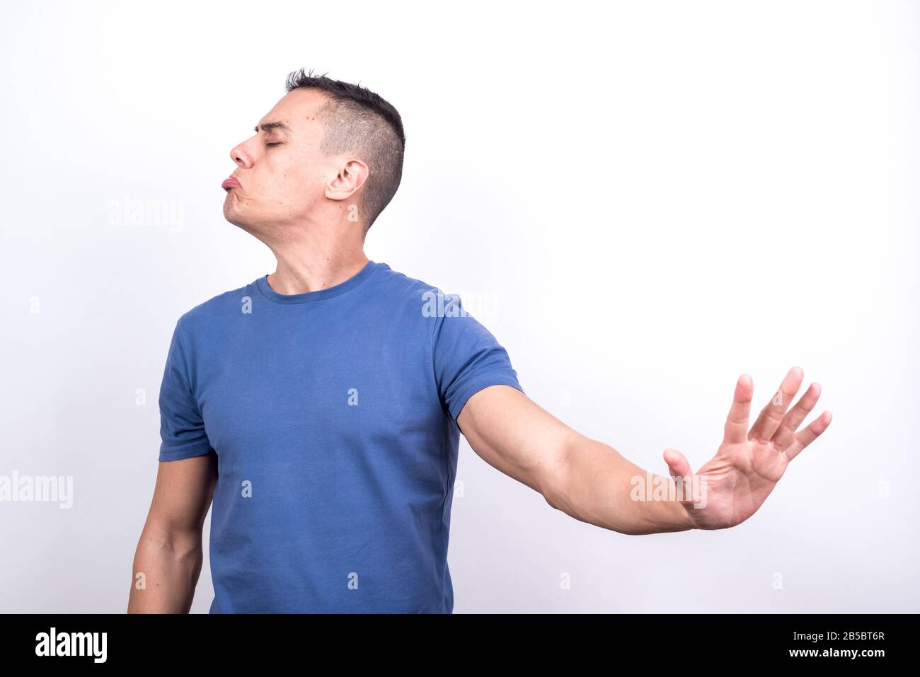Angry man. white background, medium shot Stock Photo - Alamy