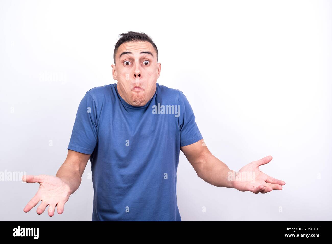 Doubting man. White background, Medium shot Stock Photo - Alamy