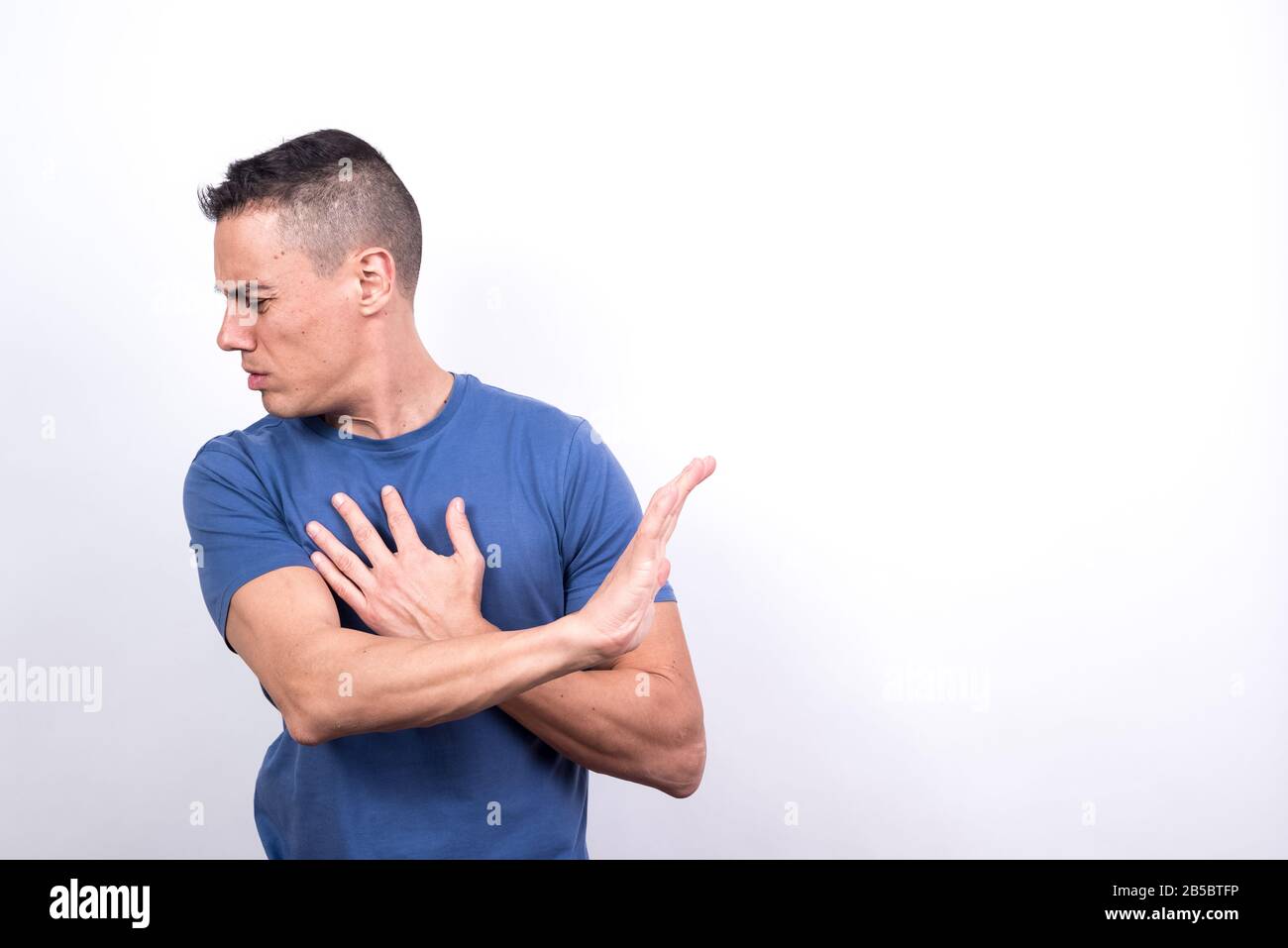 Angry man. white background, medium shot Stock Photo - Alamy