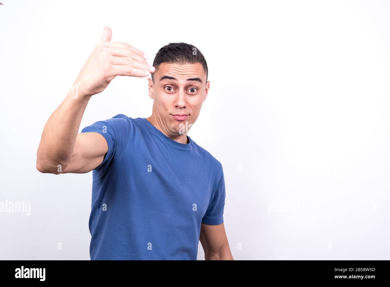 Man encouraging others to follow him. White background, Medium shot ...