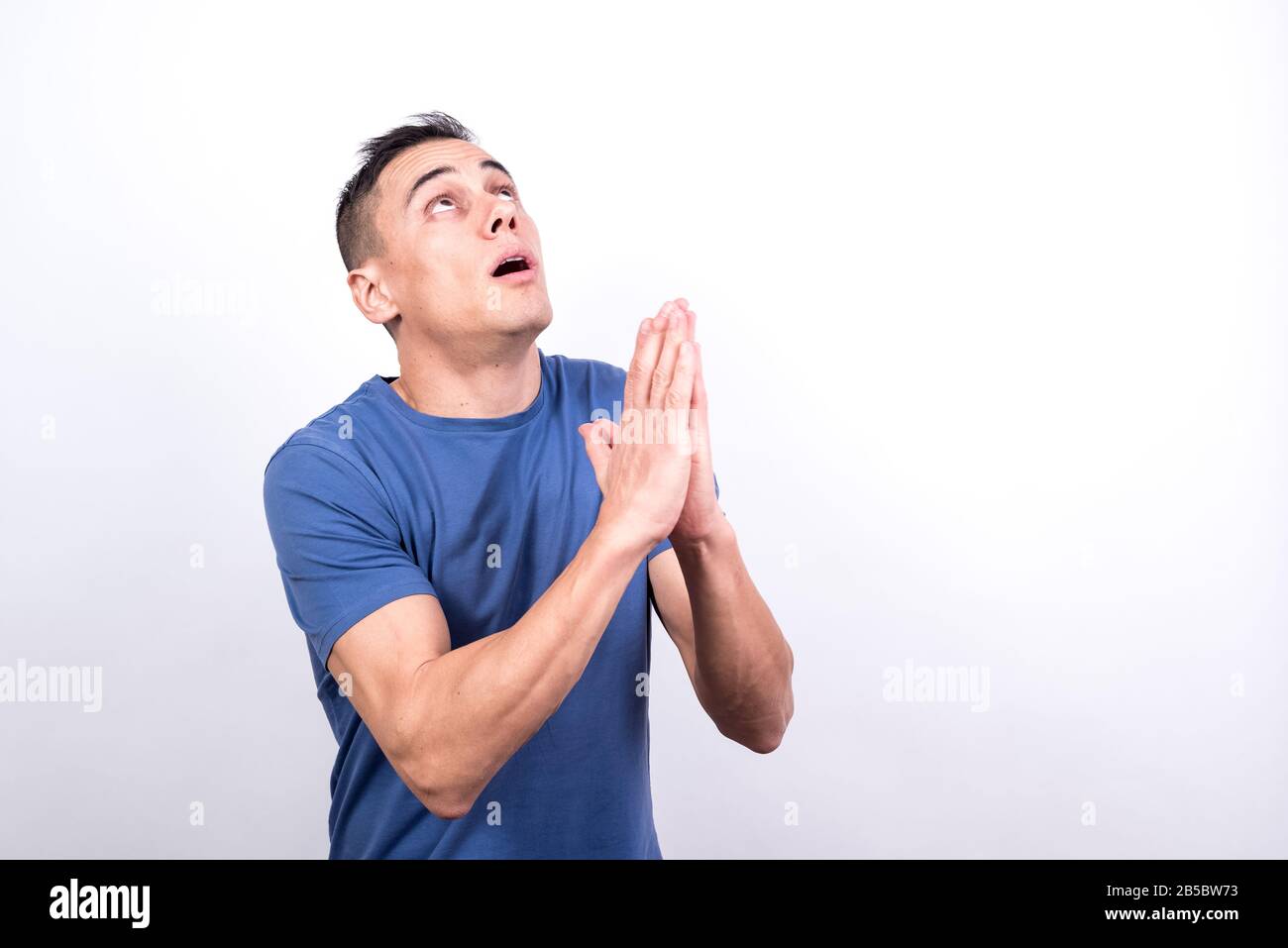 Man praying. White background, Medium shot Stock Photo - Alamy