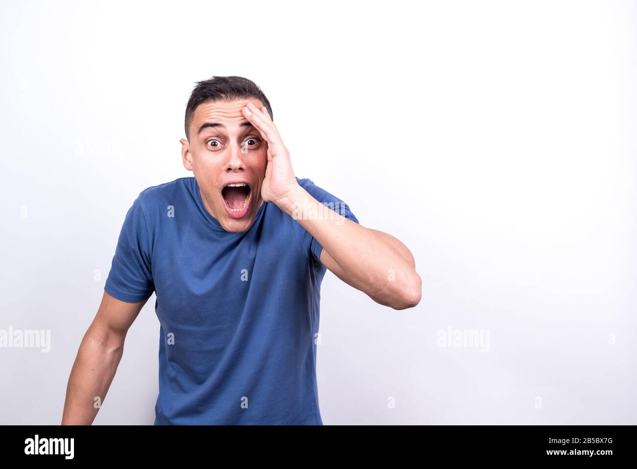 Surprised man. White background, Medium shot Stock Photo - Alamy