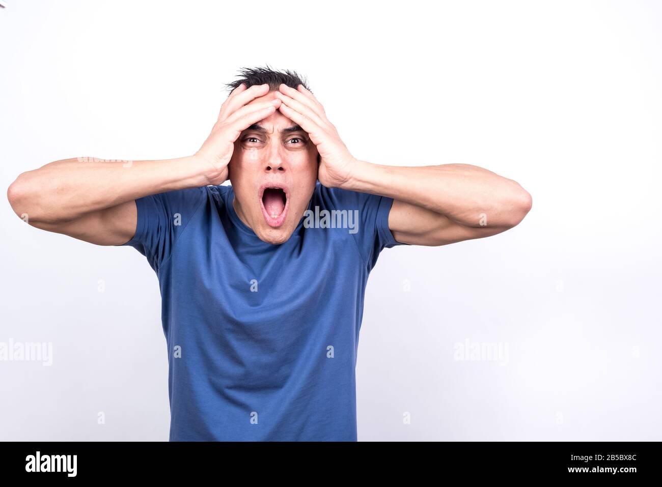 Surprised man. White background, Medium shot Stock Photo - Alamy