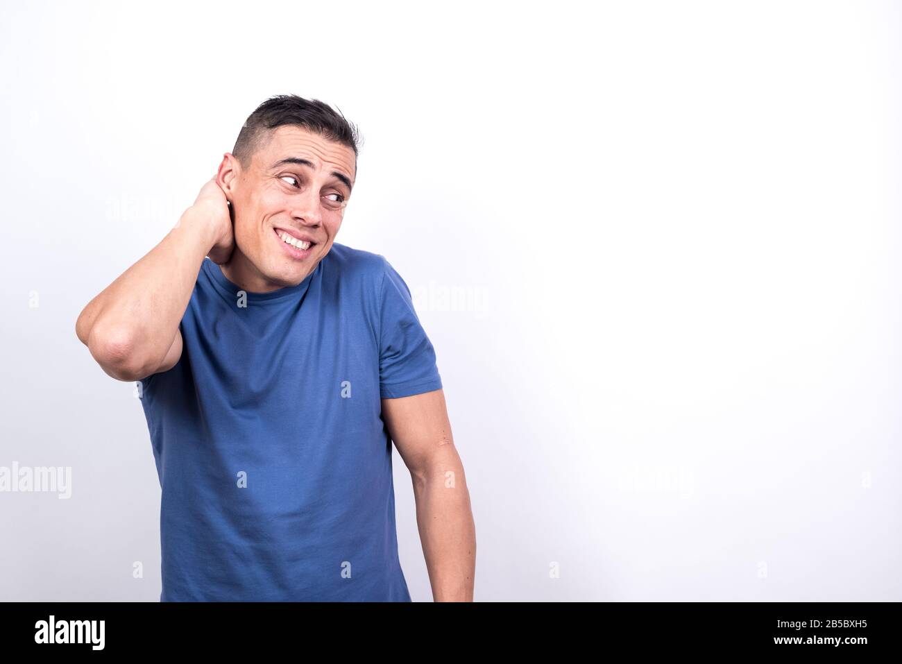 Shy man. White background, Medium shot Stock Photo - Alamy